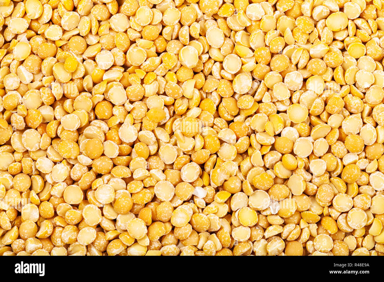 many raw yellow split peas Stock Photo - Alamy