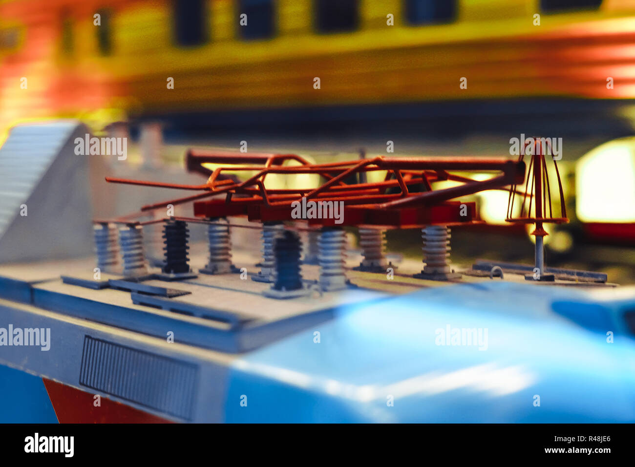 Miniature toy model of modern train crossing bridge Stock Photo - Alamy