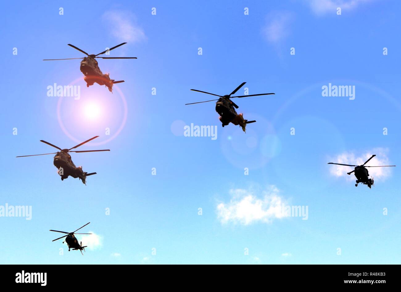 Military helicopter parade under blue sky Stock Photo - Alamy
