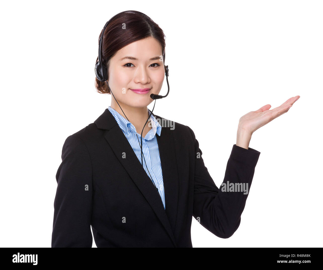 Customer services representative with open hand palm Stock Photo - Alamy