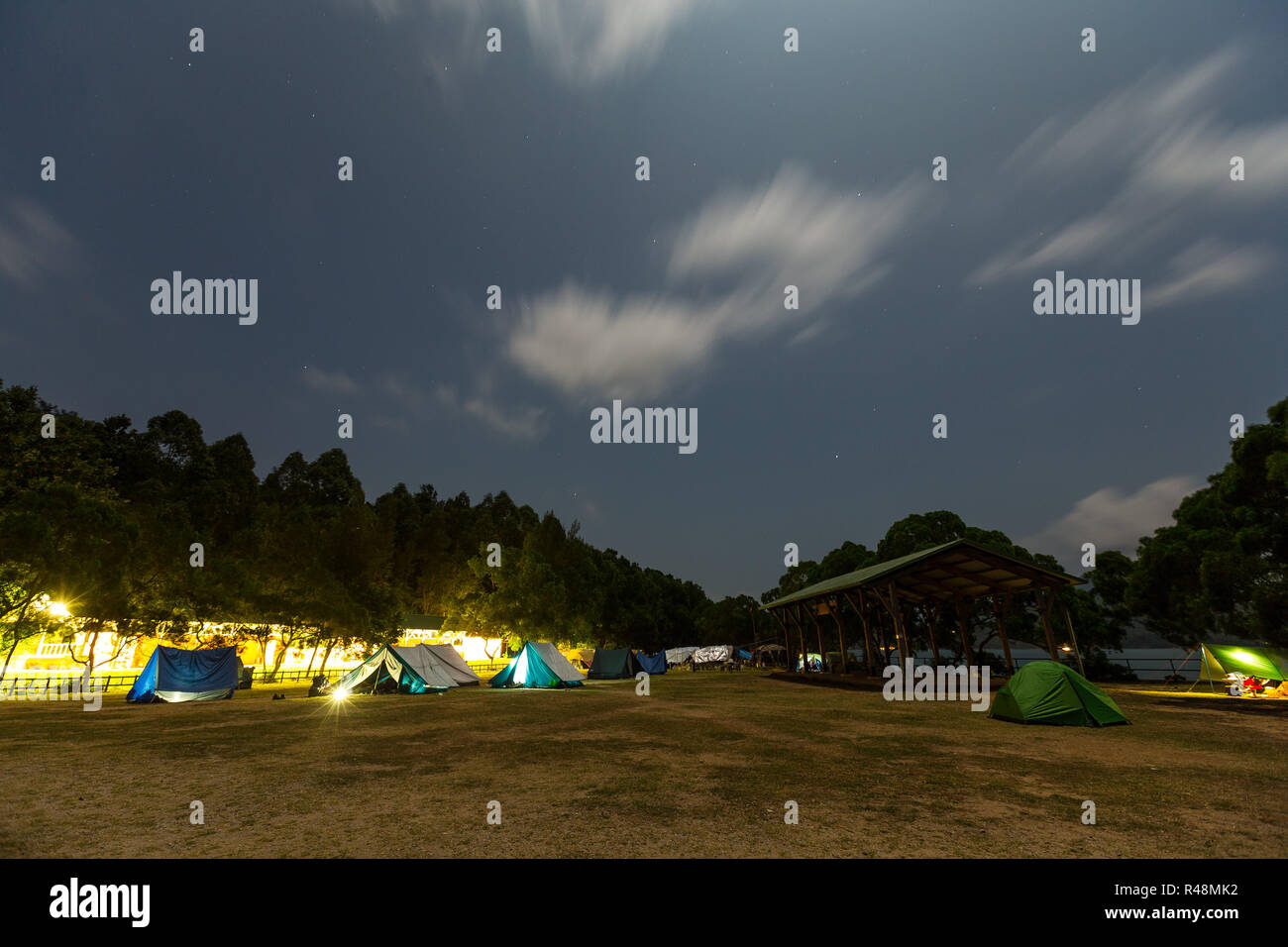 Campsite at Night Stock Photo - Alamy