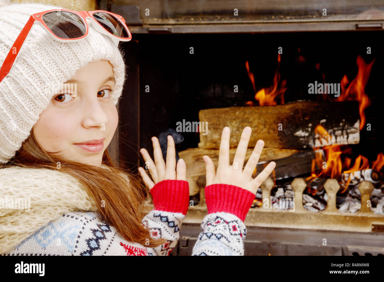 Pretty girl fire place hi-res stock photography and images - Alamy