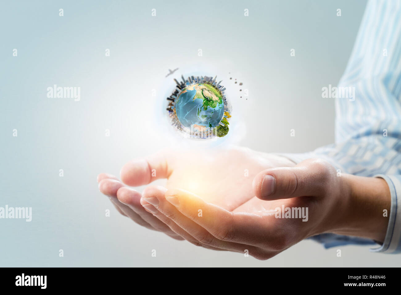 World is in the palm of your hands hi-res stock photography and images ...