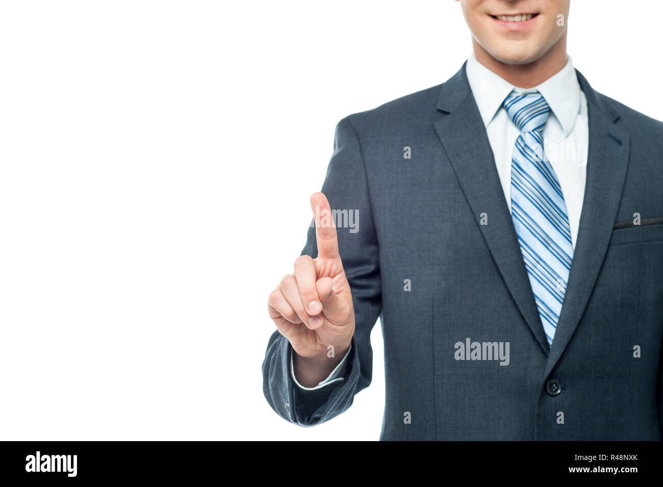 Corporate man showing index finger Stock Photo - Alamy