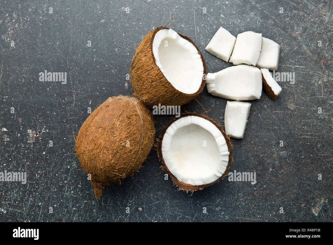 halved and whole coconut Stock Photo - Alamy