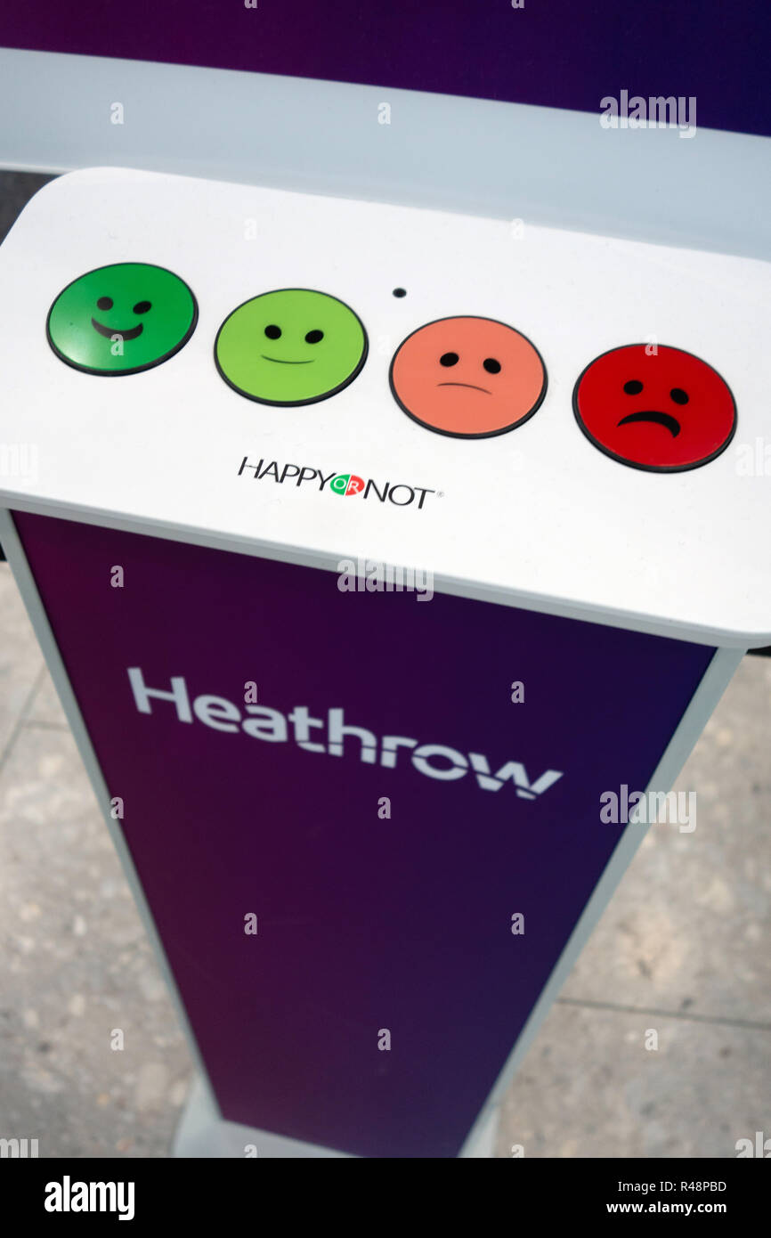 Happy or Not voting for service buttons at Check-in at Heathrow Airport ...