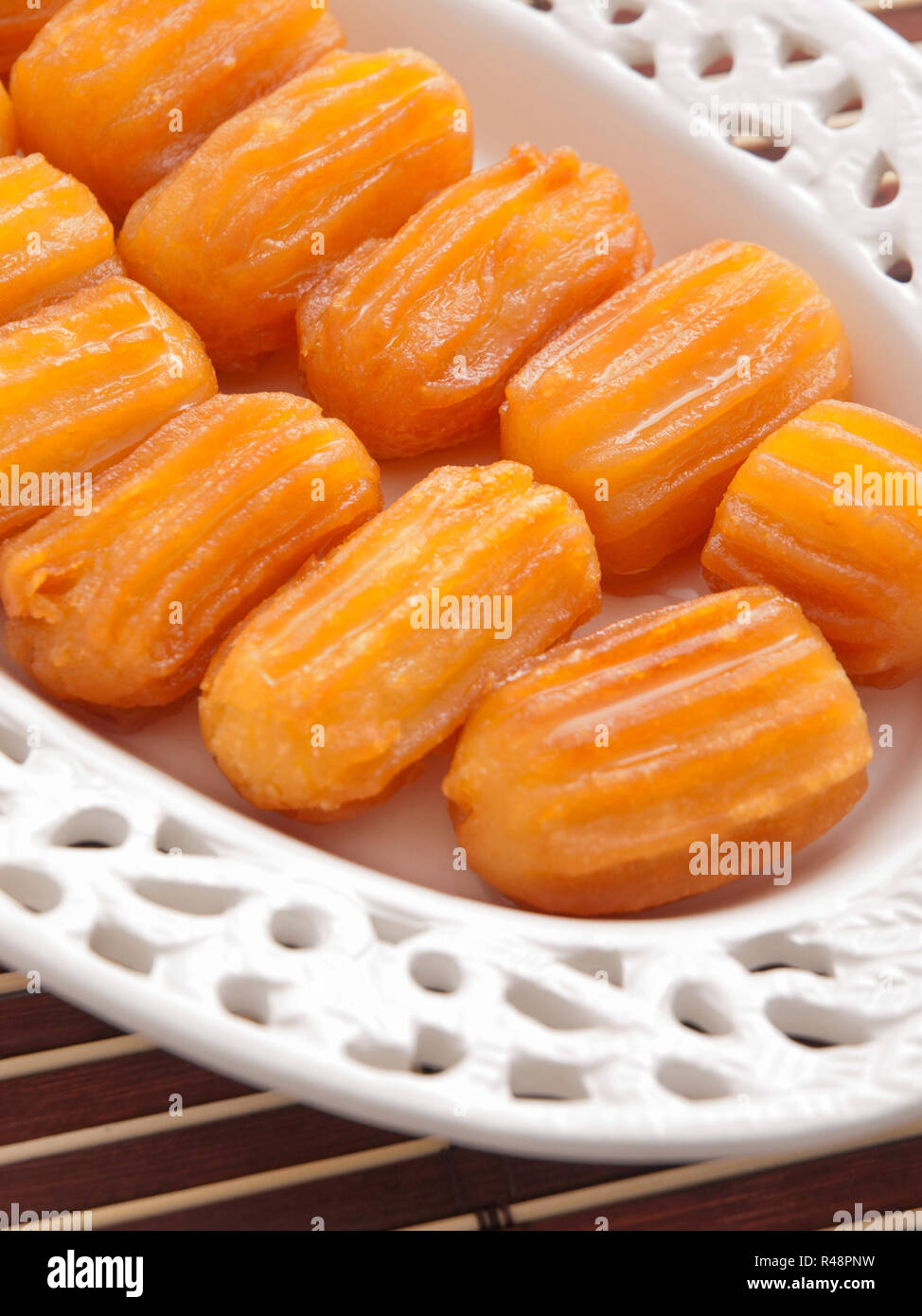 Mini syrup cakes,Mini syrup cakes Stock Photo - Alamy