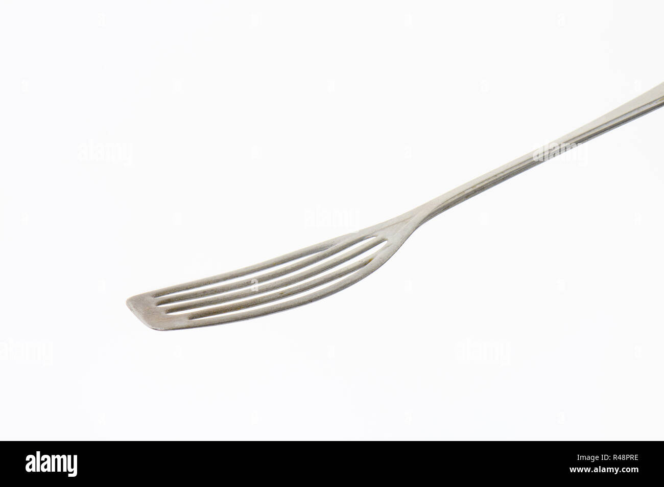 Metal kitchen utensil fish Cut Out Stock Images & Pictures - Alamy