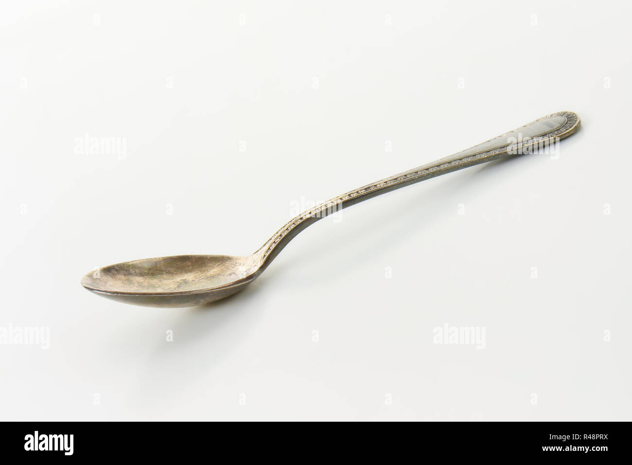 Old silver spoon Stock Photo - Alamy