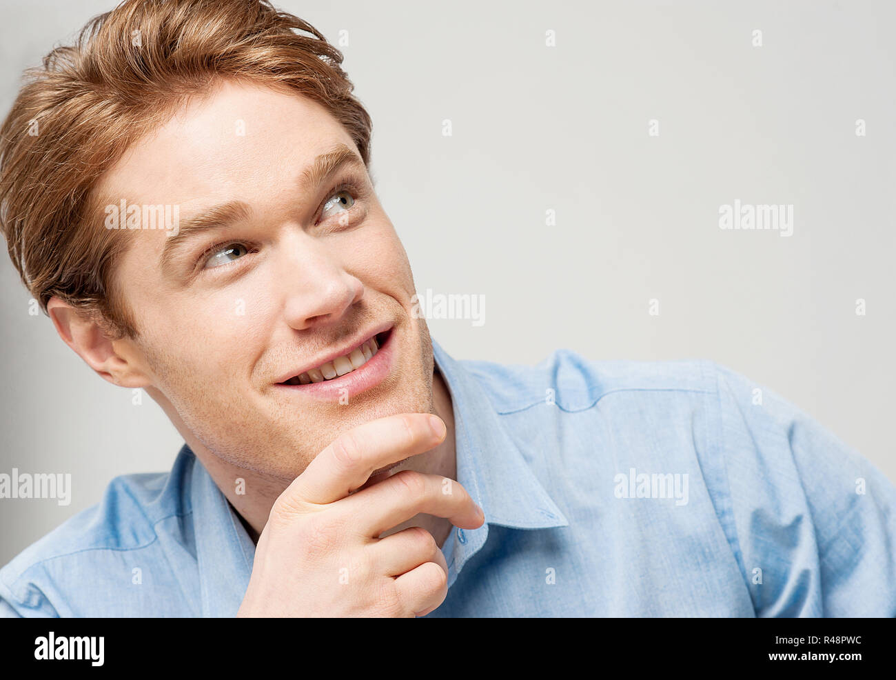 Portrait of a pensive young guy Stock Photo - Alamy