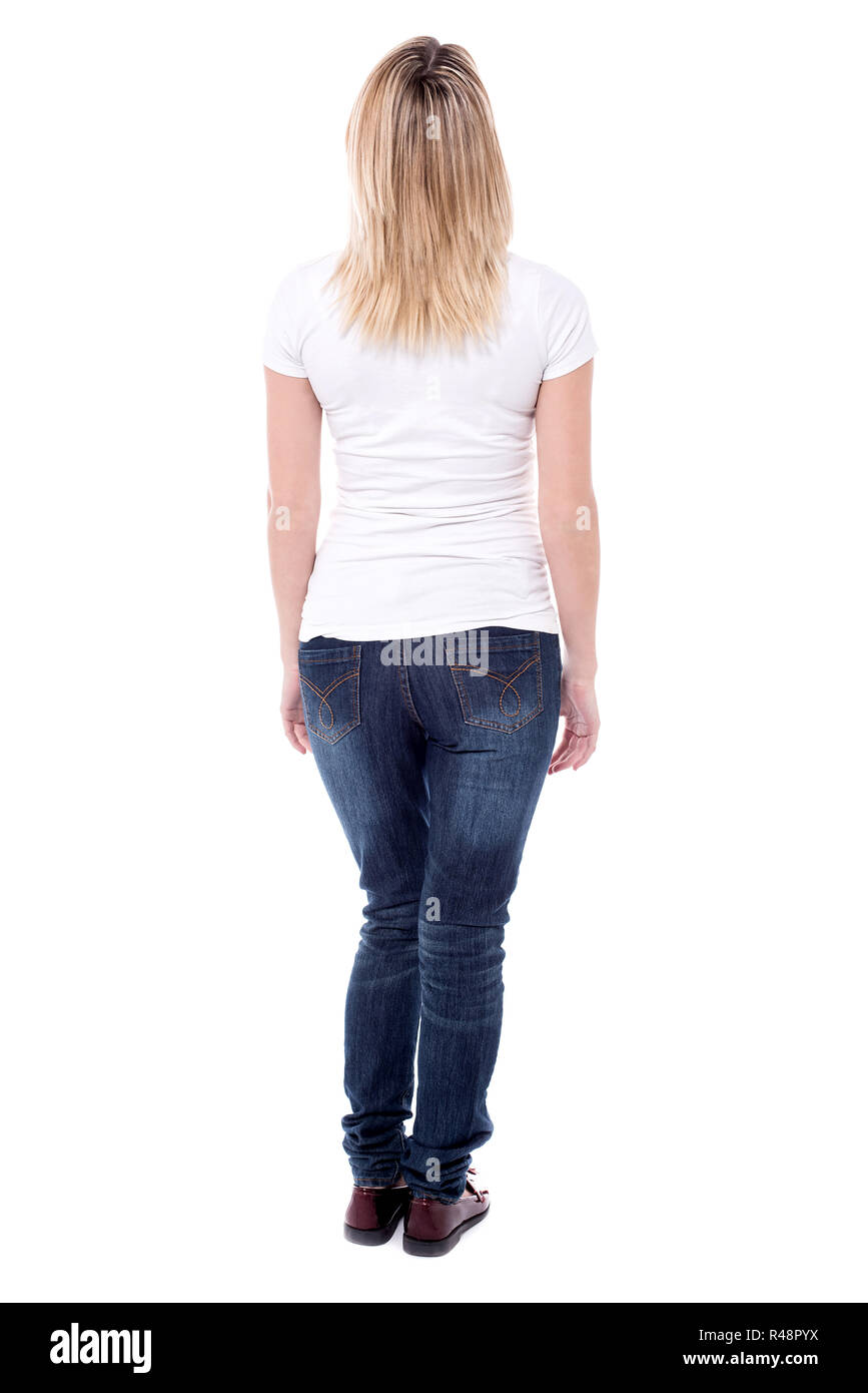 Woman standing rear view jeans Cut Out Stock Images & Pictures - Alamy