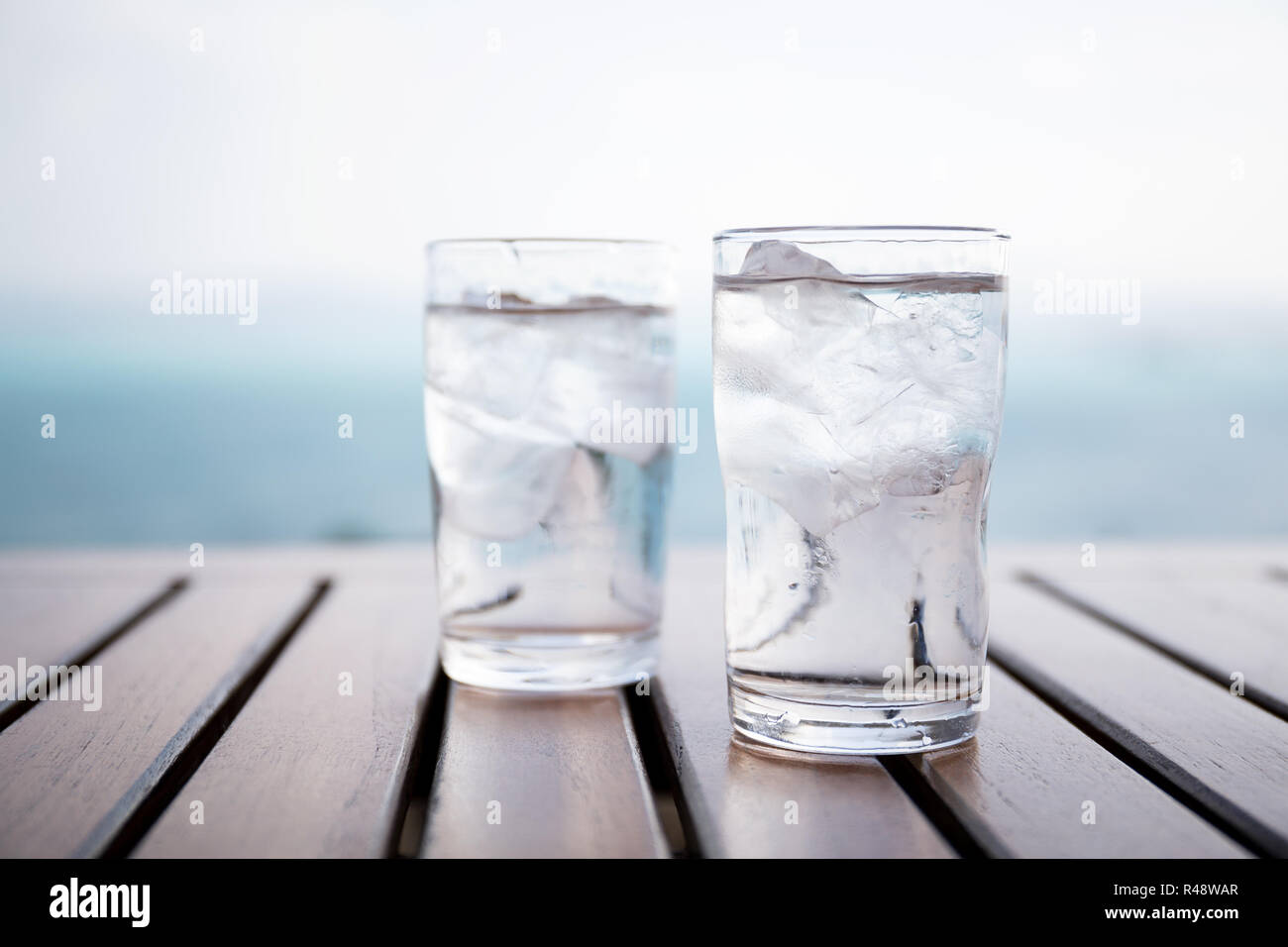 Glass of iced water at restaurant Stock Photo - Alamy