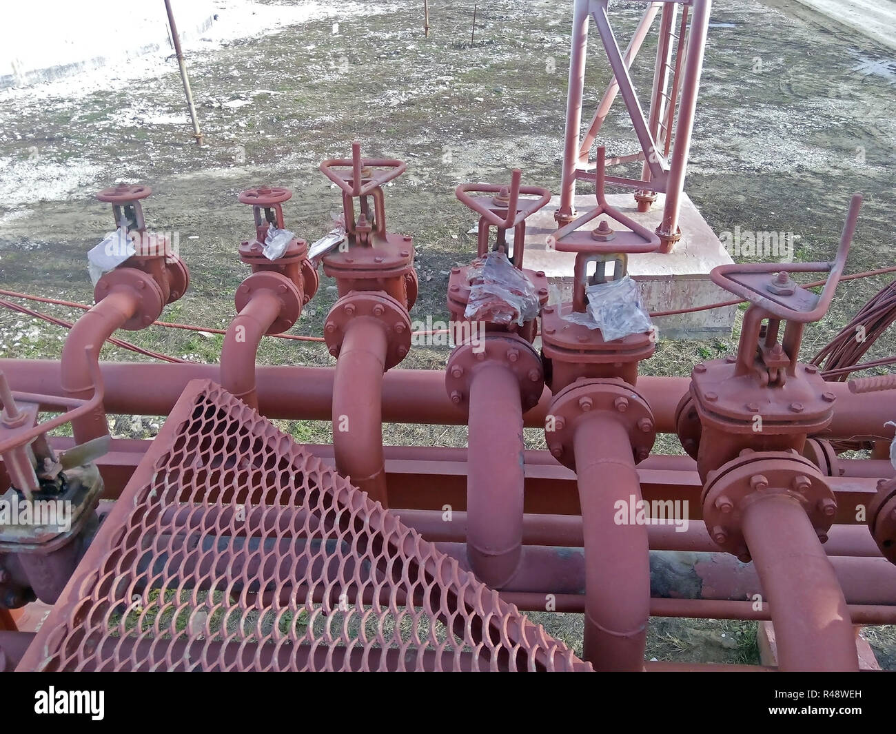 Valves on the pipeline for pumping oil Stock Photo - Alamy