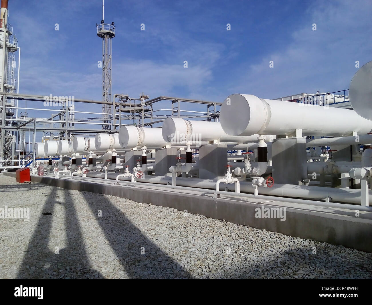 Heat exchangers in a refinery Stock Photo - Alamy