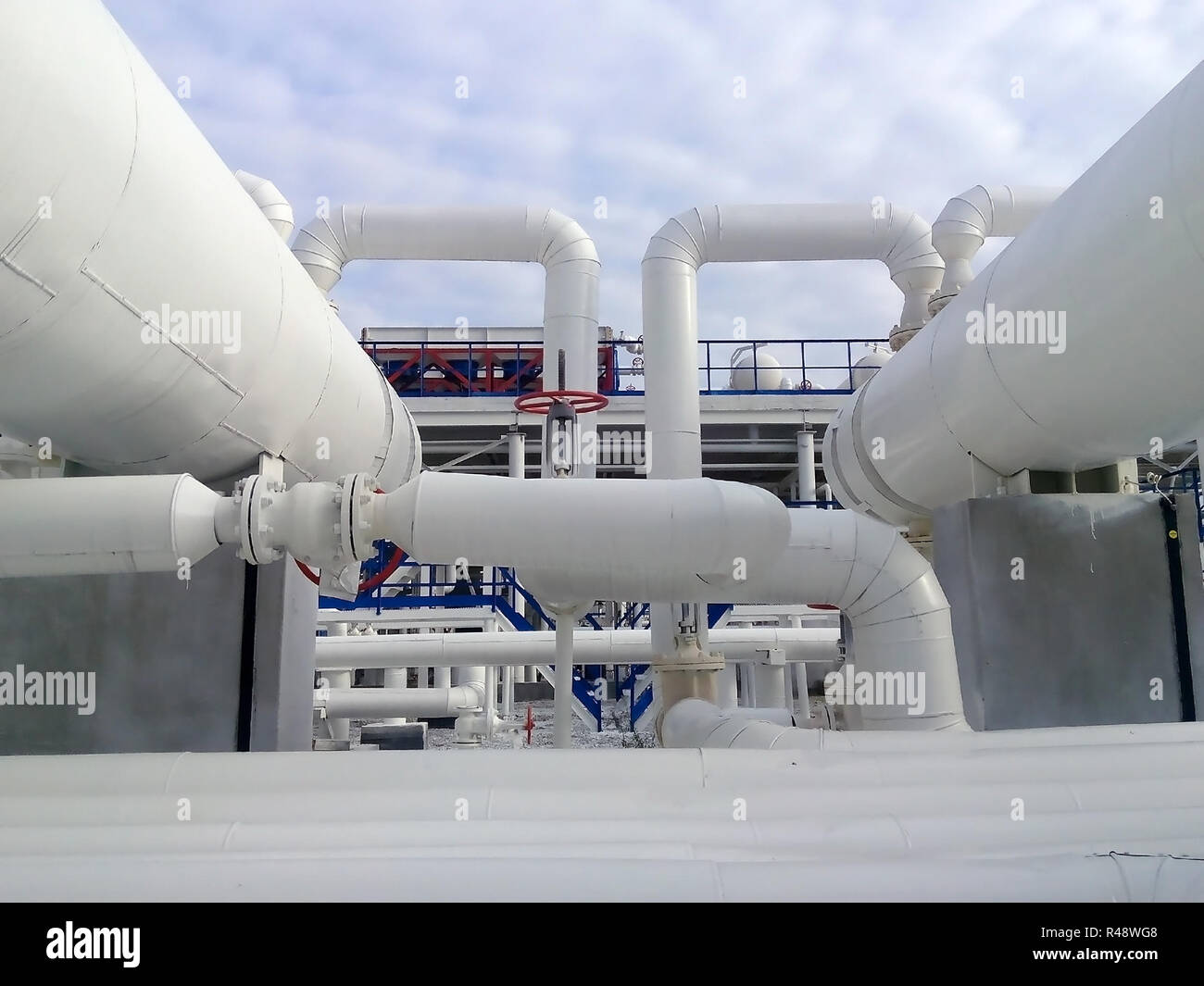 Heat exchangers in a refinery Stock Photo - Alamy