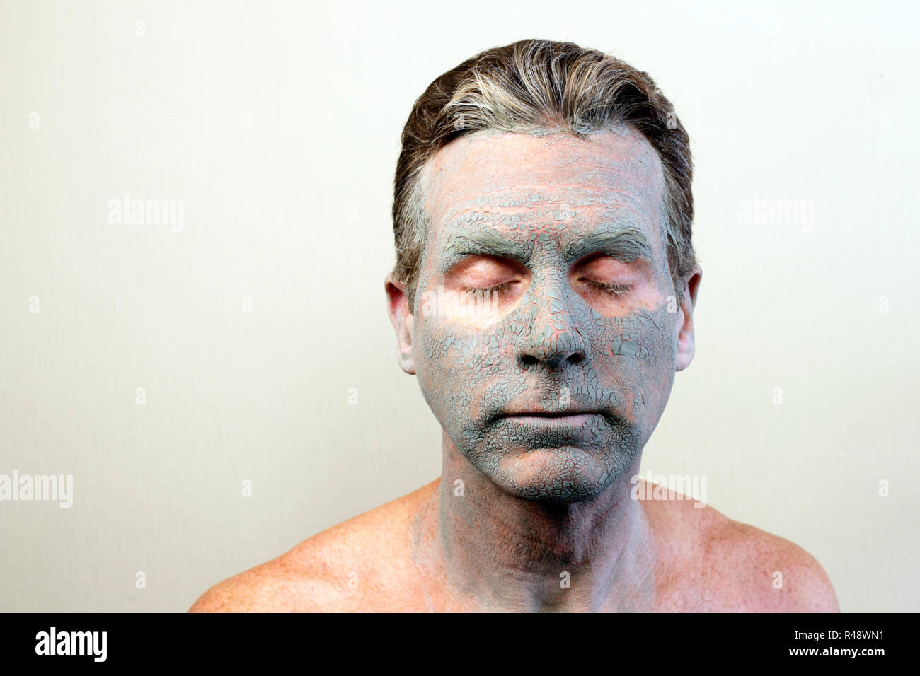 Man Wearing a Clay Mask Stock Photo - Alamy
