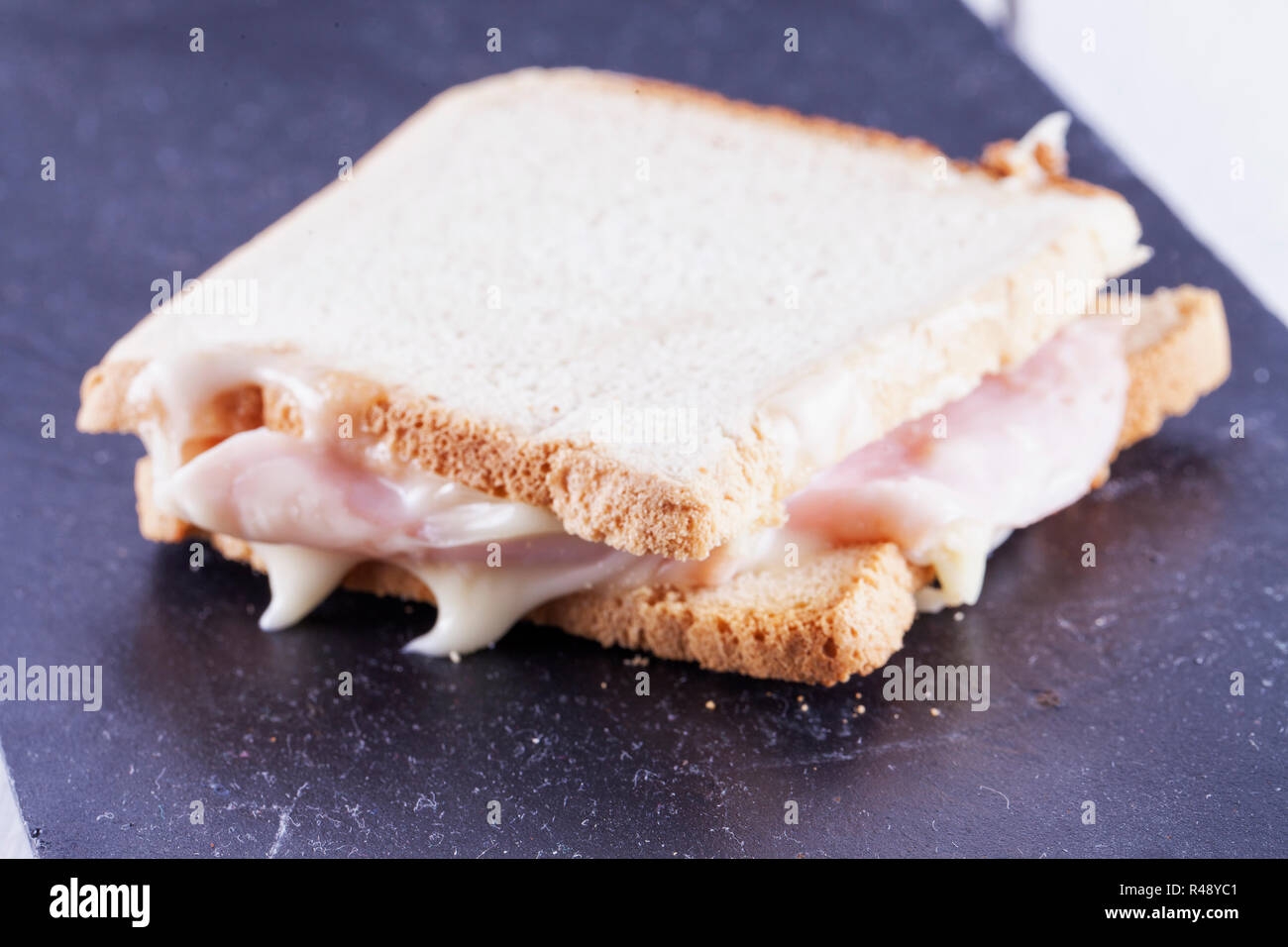 Toast over black stone Stock Photo - Alamy