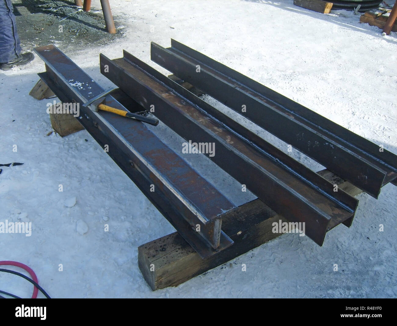 The pieces of a channel cut by welding Stock Photo - Alamy