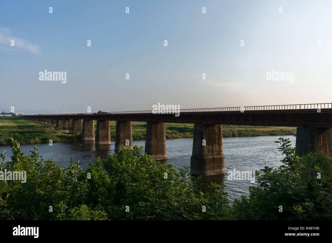 Railway over farm land Stock Photo - Alamy