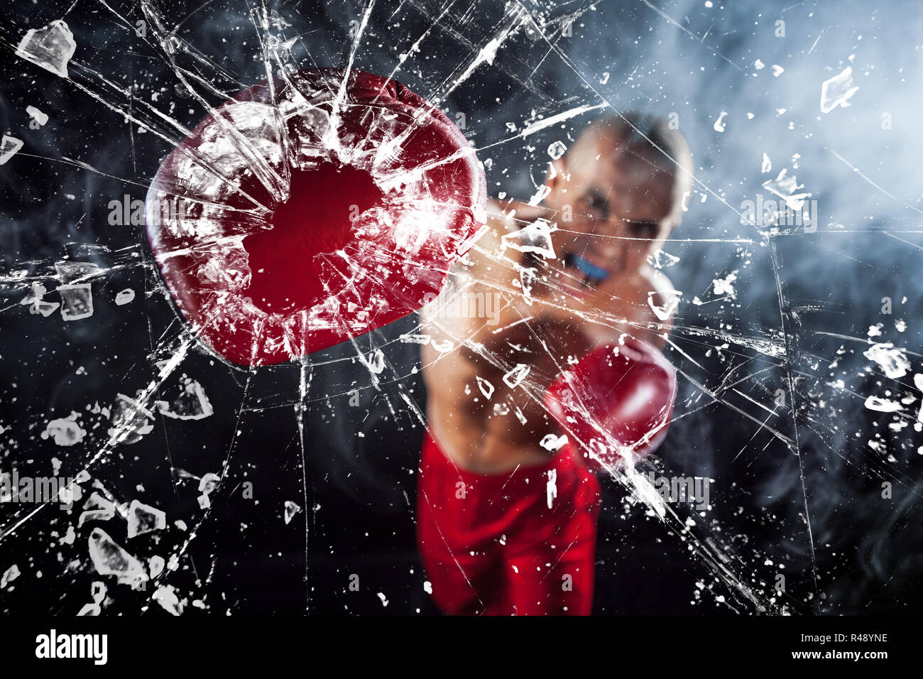 The boxer crushing a glass Stock Photo - Alamy
