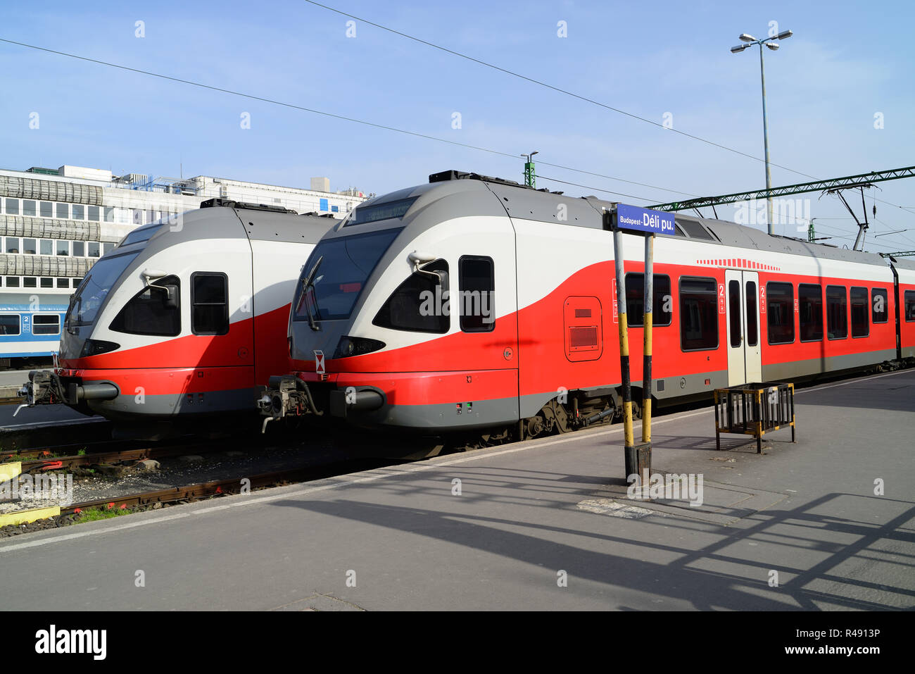 Red trains at Budapest station Stock Photo - Alamy