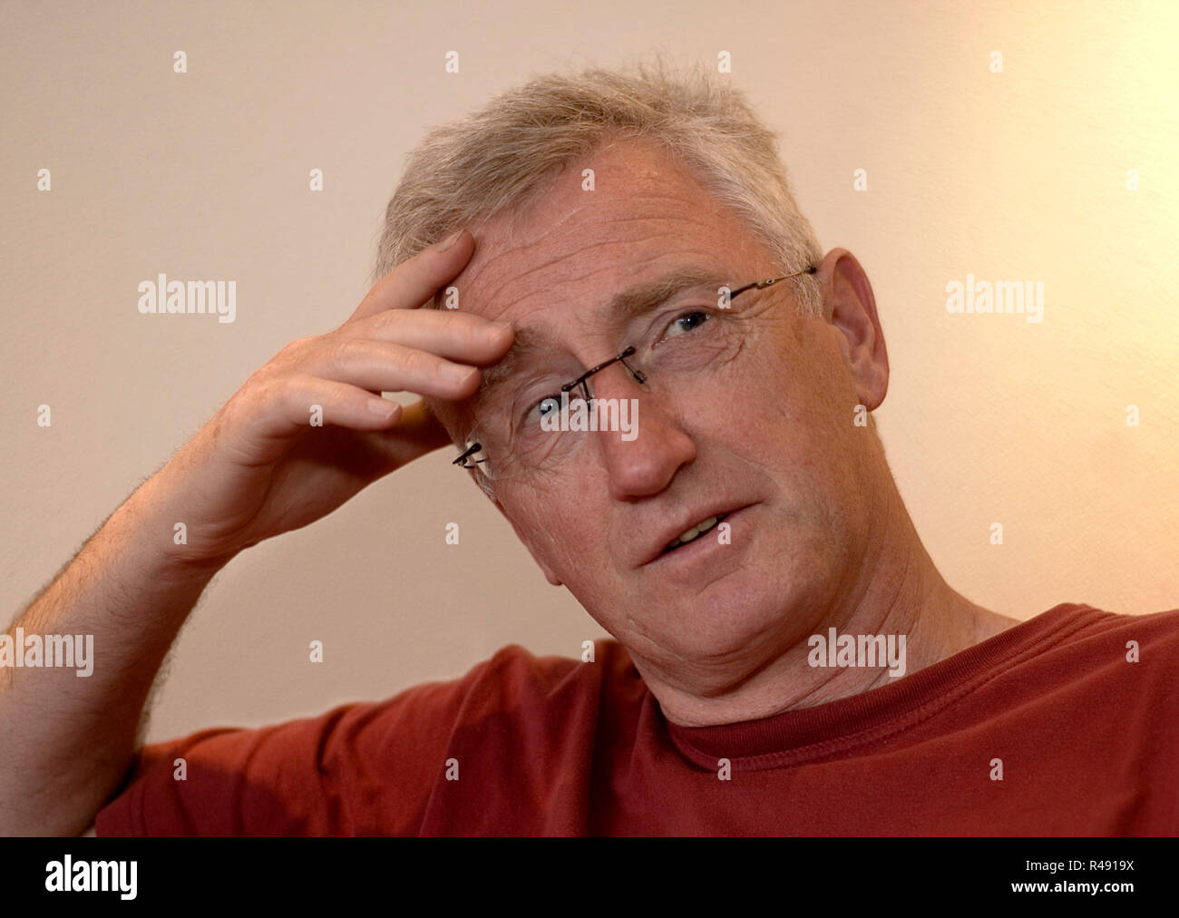 Senior man thinking Stock Photo - Alamy
