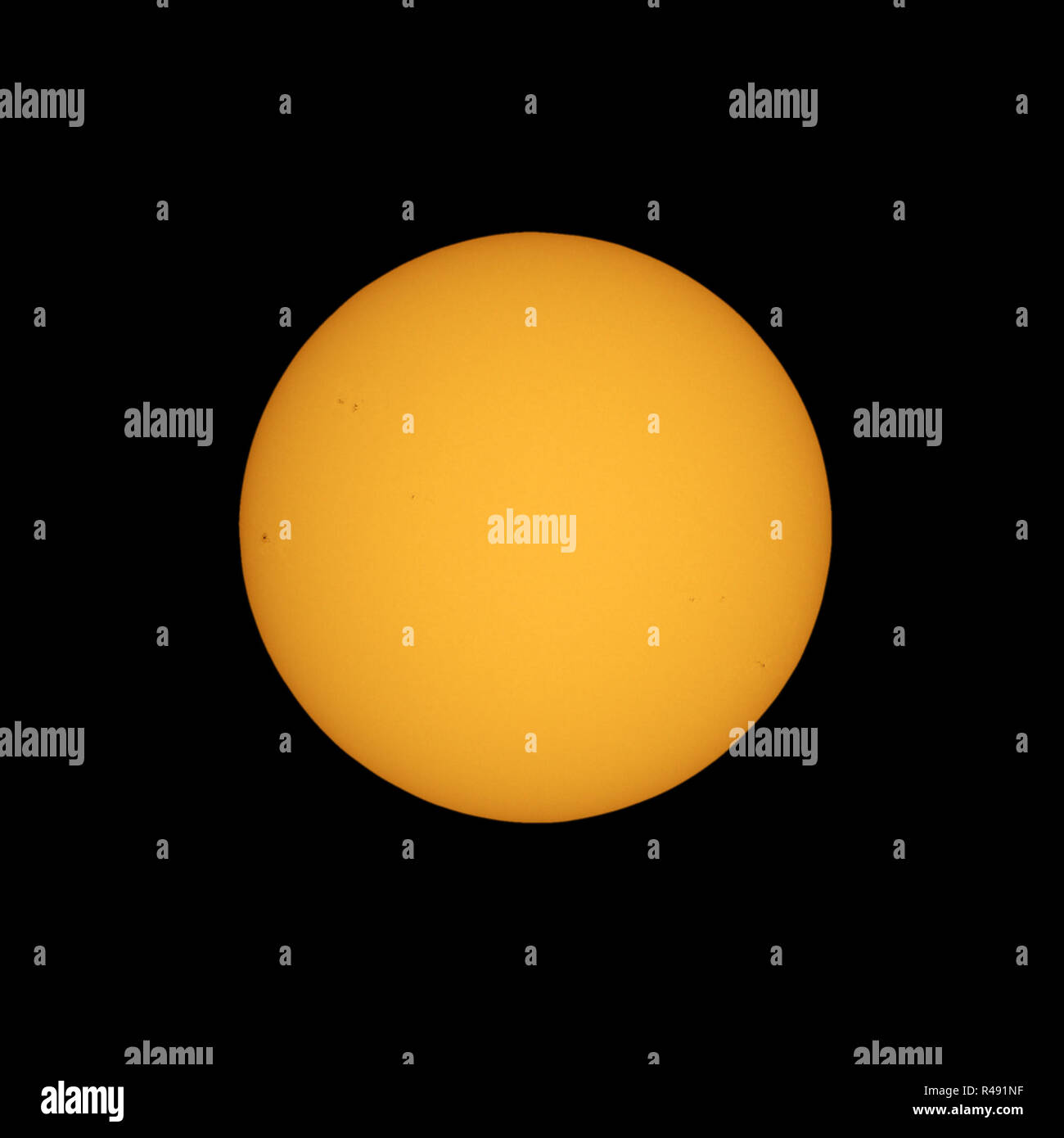 Sun with sunspots seen with telescope Stock Photo - Alamy