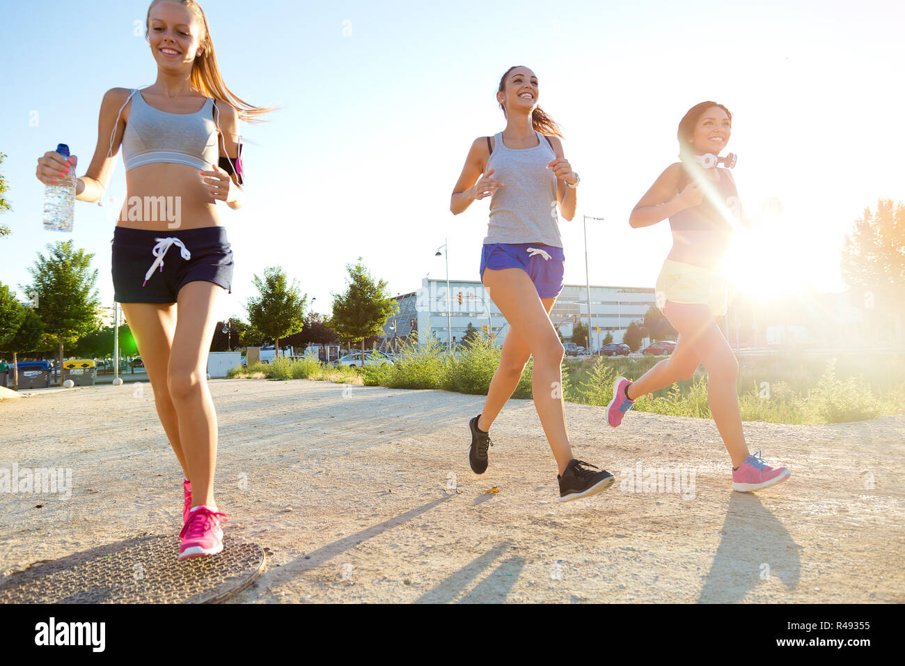 Group of women running in the park Stock Photo - Alamy