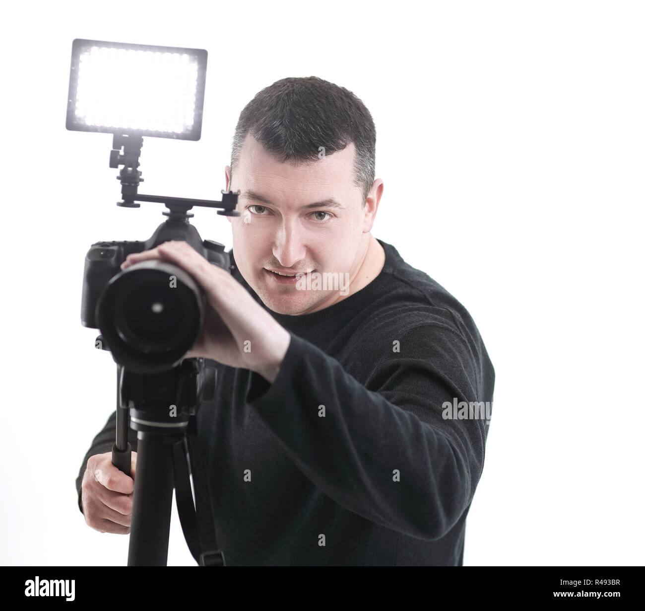 portrait of a successful photographer .isolated on white background ...