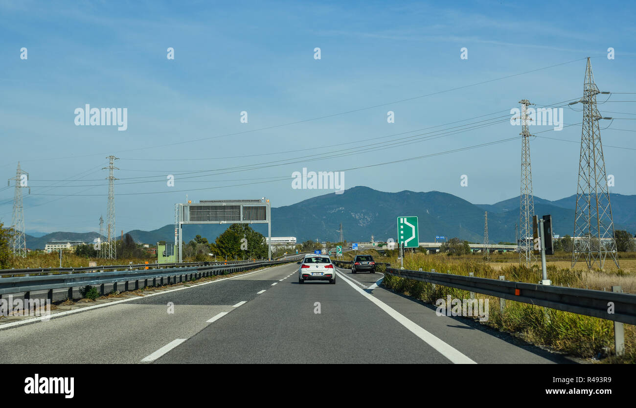 Rome, Italy - Oct 13, 2018. Vehicles run on highway in Rome, Italy. The ...