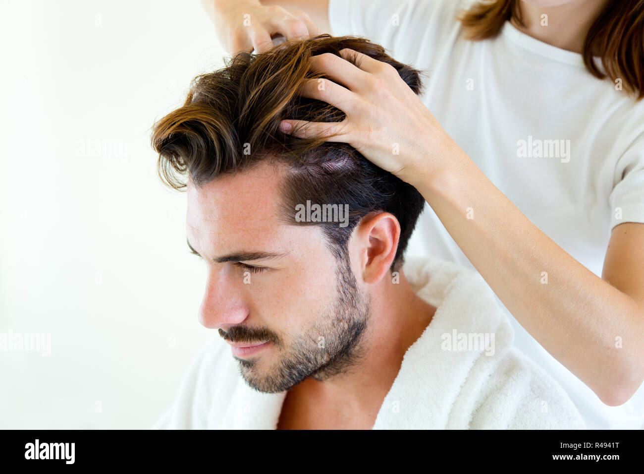 Masseur doing massage on man body in the spa salon Stock Photo - Alamy