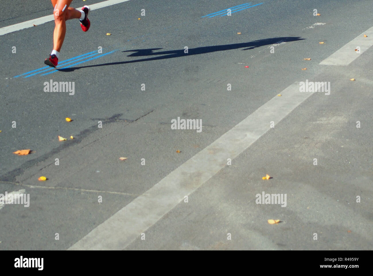 runners with shadow Stock Photo - Alamy