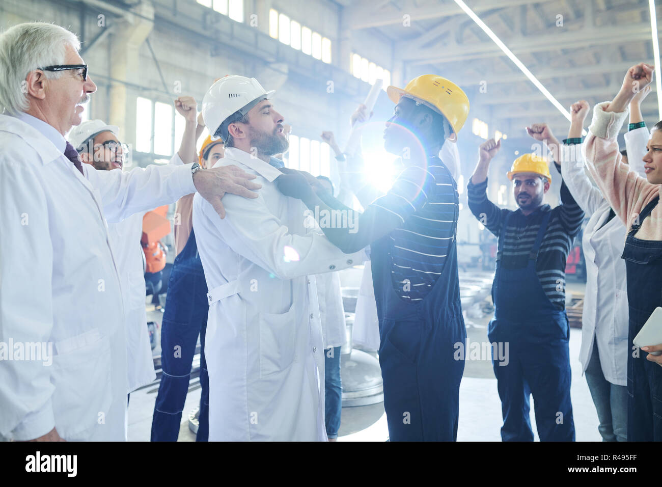 Factory Workers Attacking Boss Stock Photo - Alamy