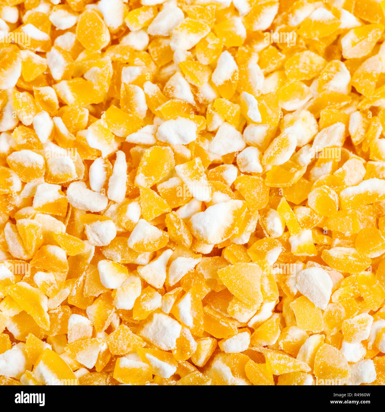 raw crushed corn groats close up Stock Photo - Alamy