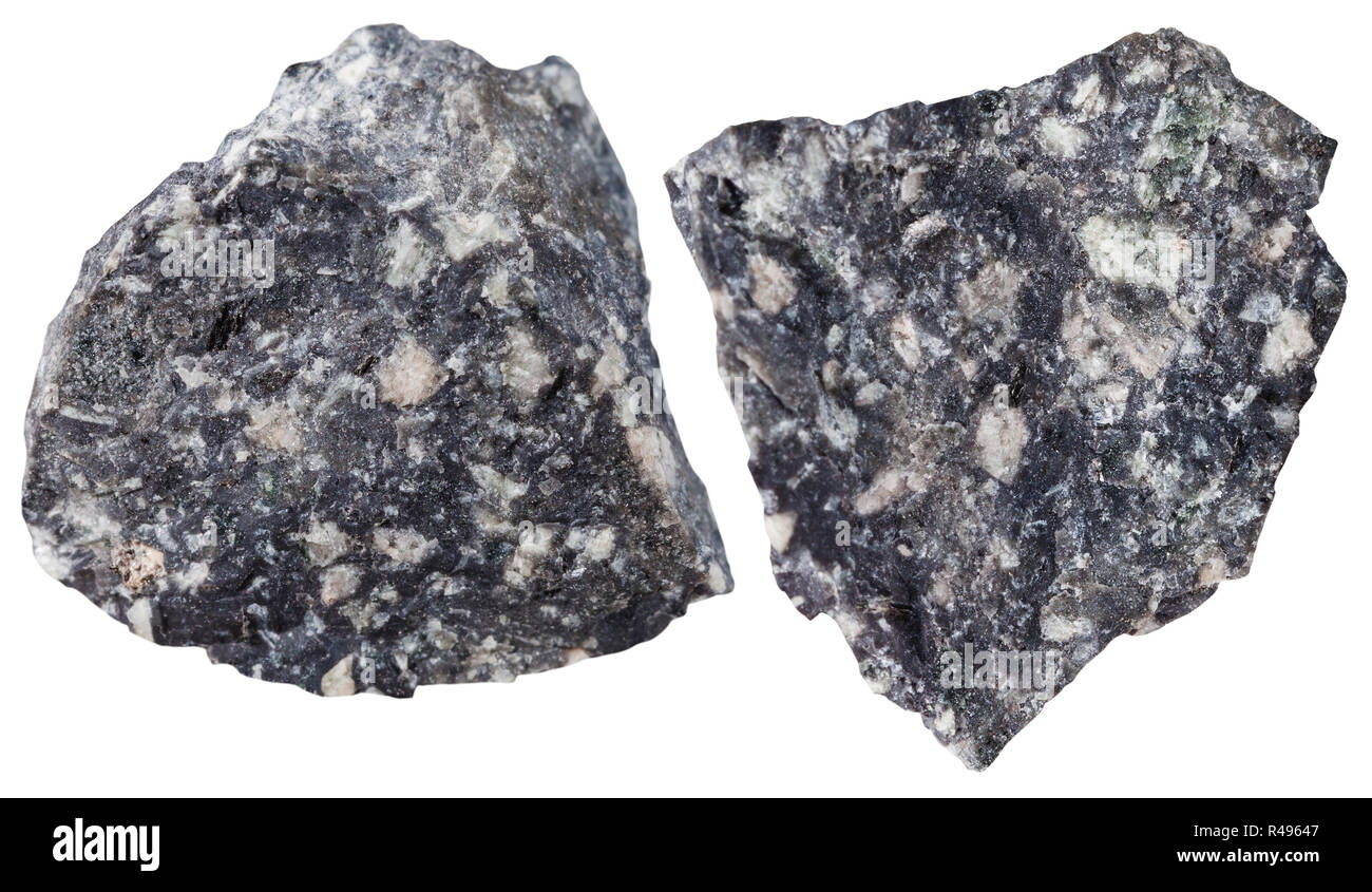 two pieces of Andesite mineral stone isolated Stock Photo - Alamy