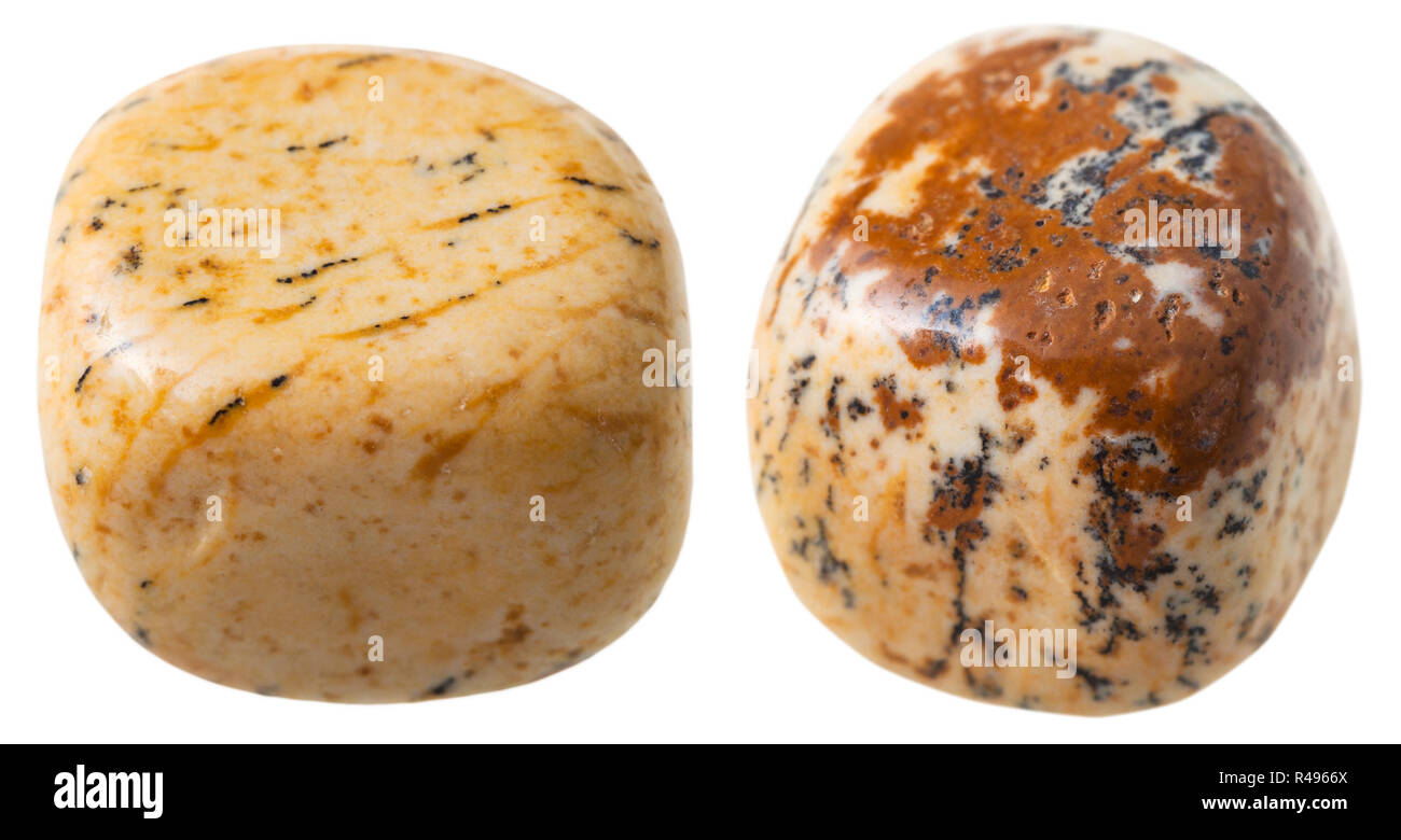 two yellow (sand) jasper gemstones isolated Stock Photo - Alamy