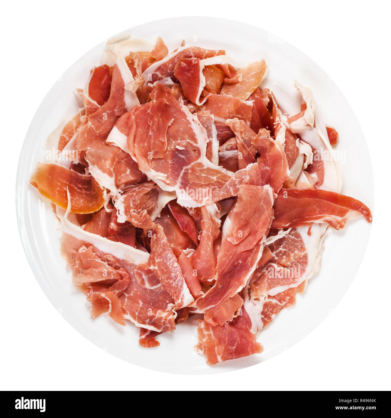 top view of thin sliced jamon on plate isolated Stock Photo - Alamy