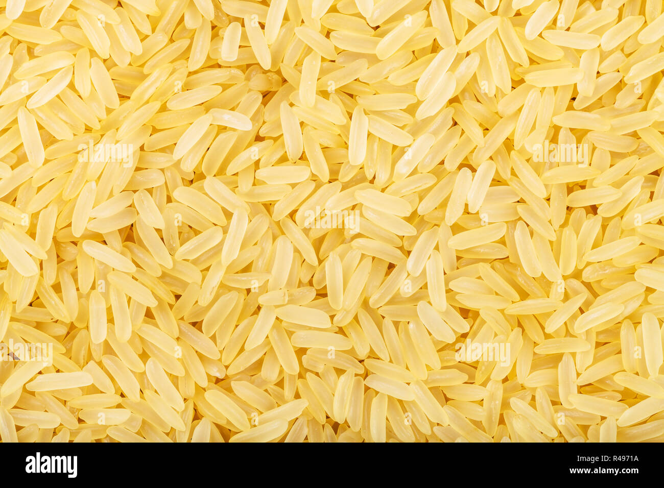 yellow converted long-grain Indica rice Stock Photo - Alamy