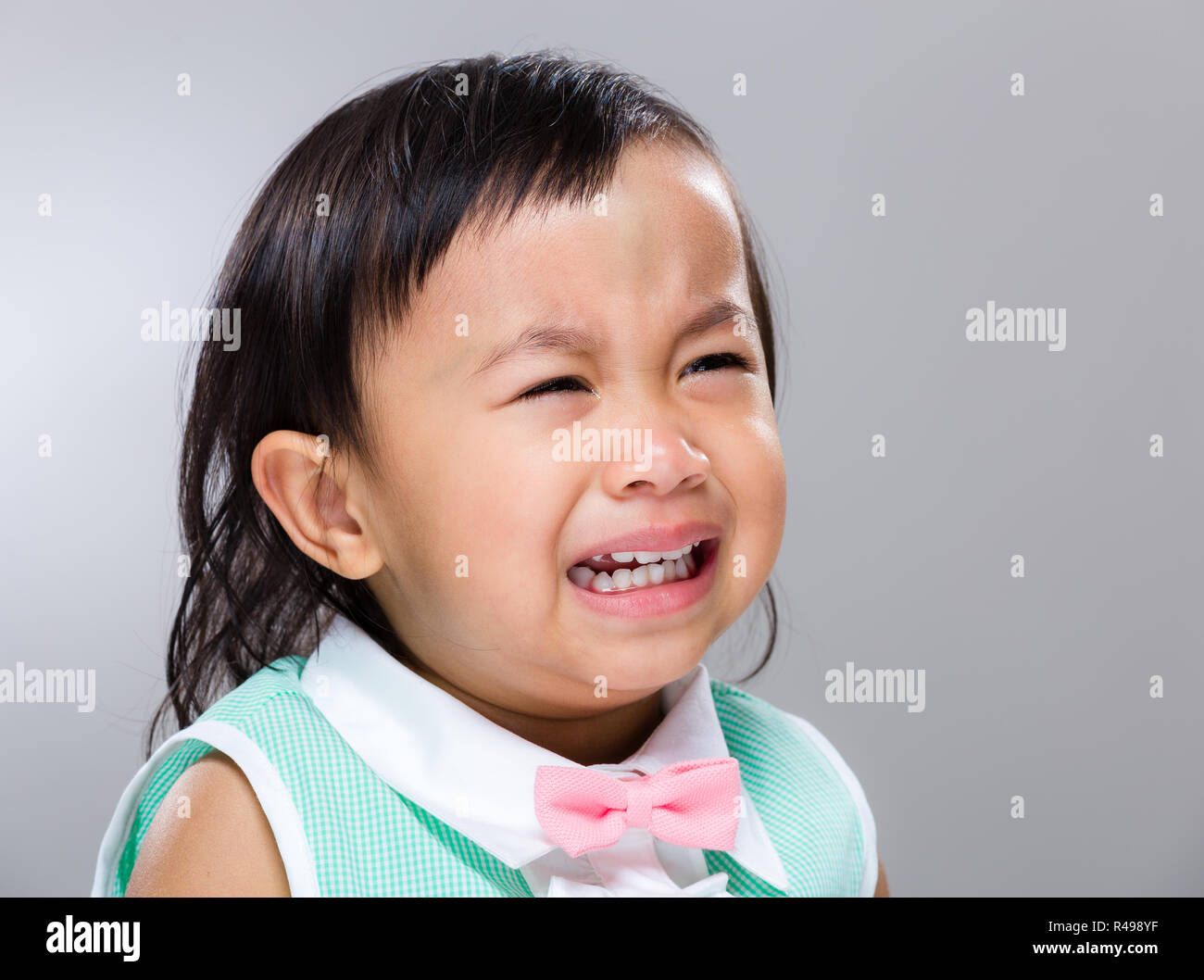 Baby girl cry Stock Photo - Alamy