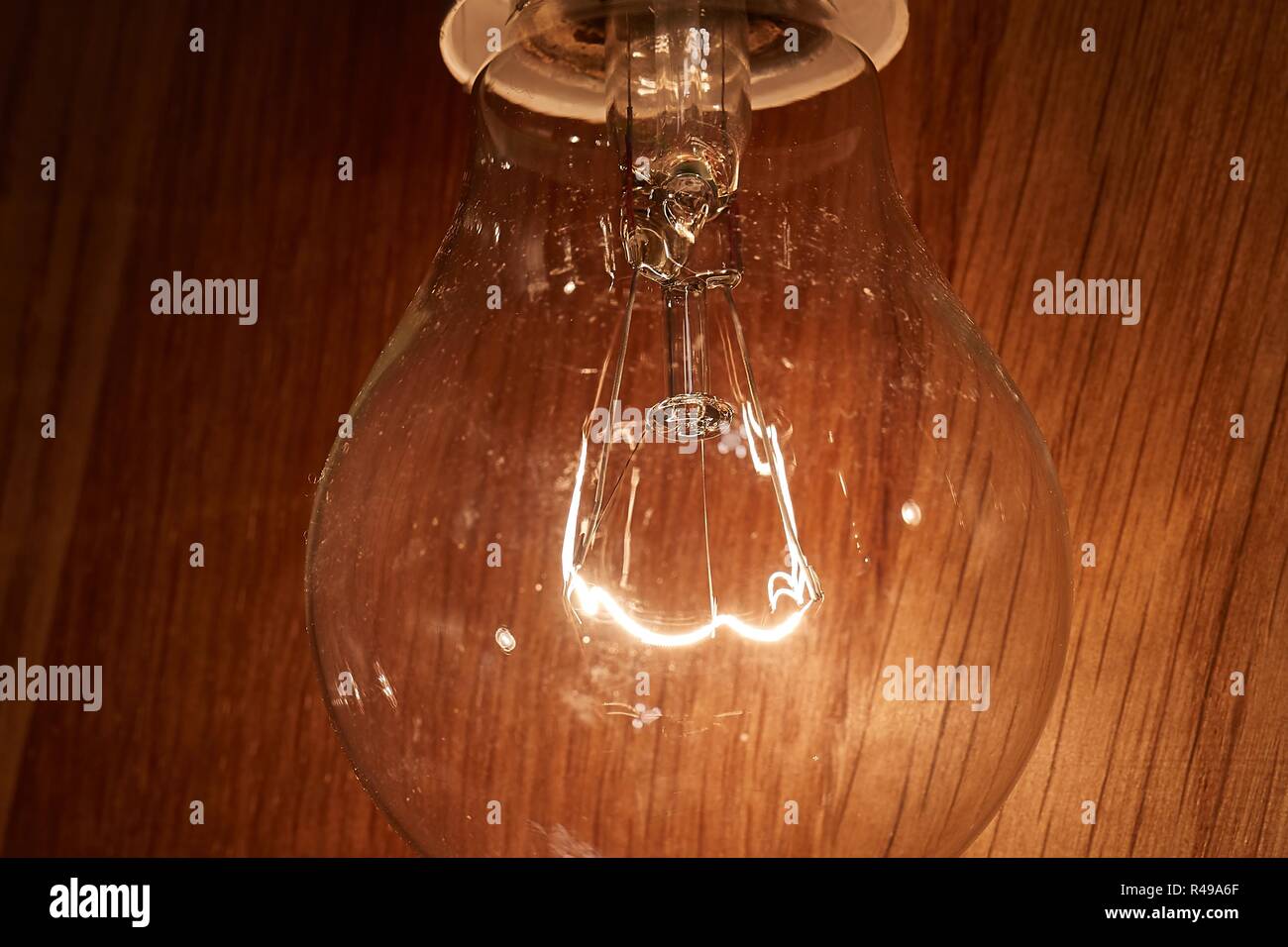 Light bulb on a table Stock Photo - Alamy