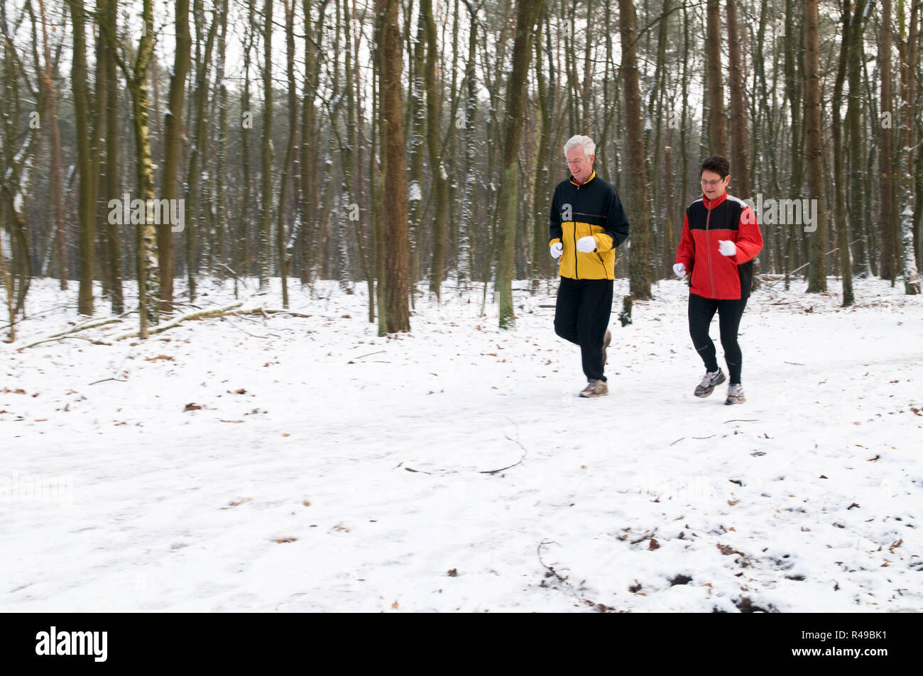 Running In The Snow Stock Photo - Alamy