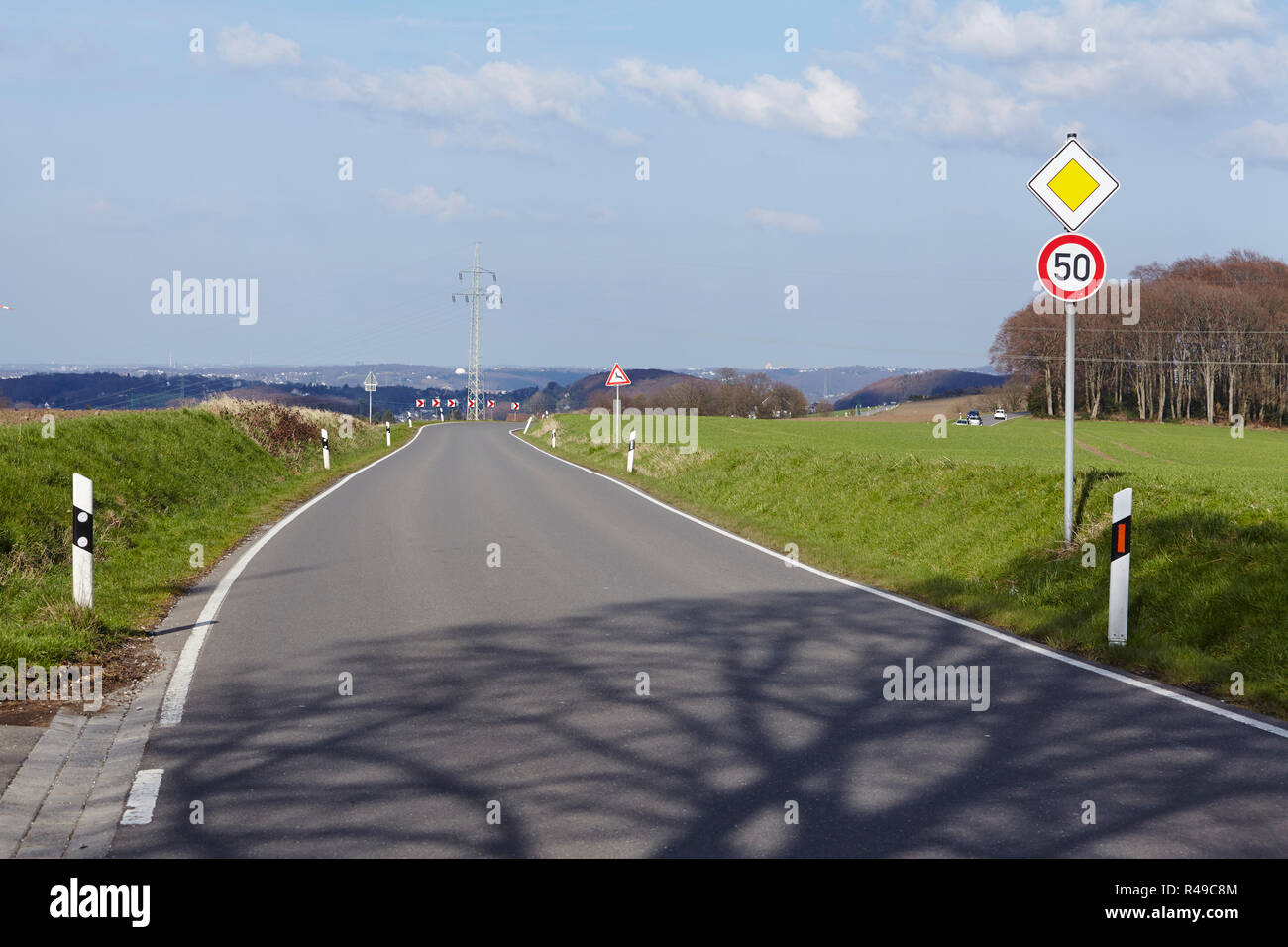 Road - Country road with sharp turn Stock Photo - Alamy