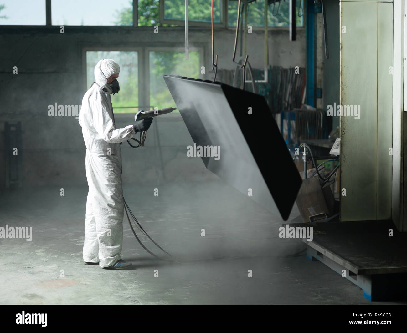 sand blasting a metal Stock Photo - Alamy