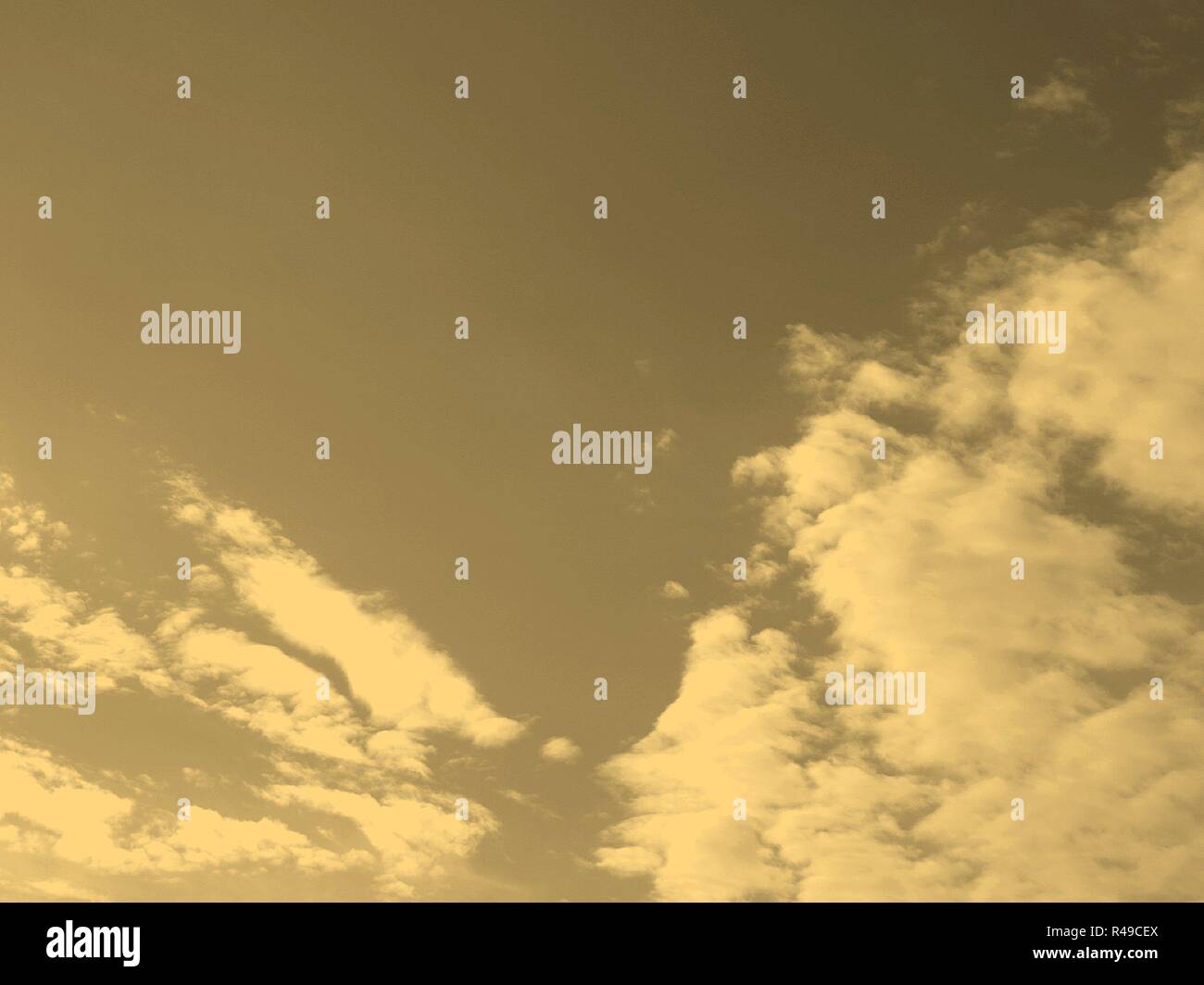Blue sky with clouds sepia Stock Photo - Alamy