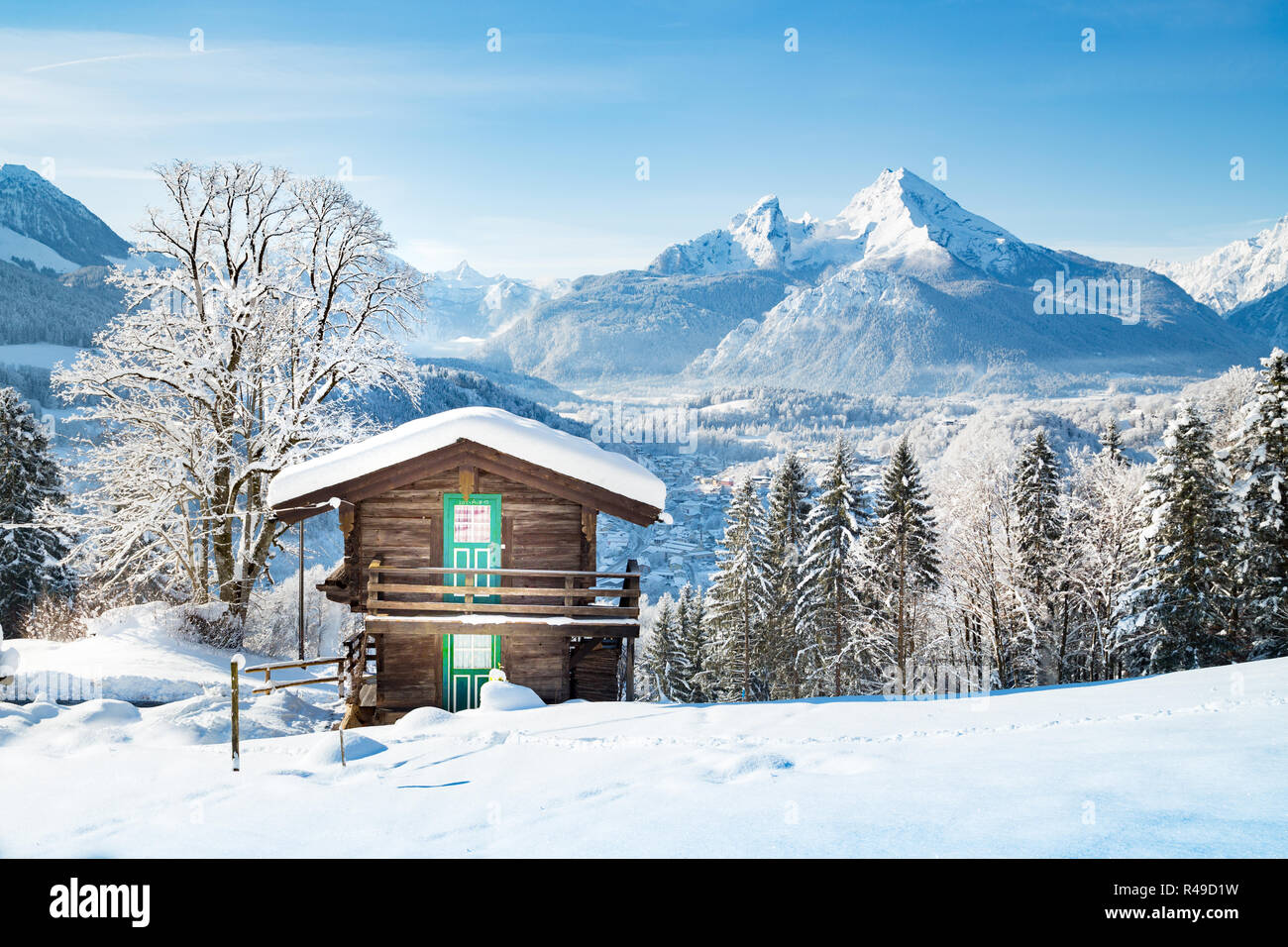 Beautiful view of traditional wooden mountain cabin in scenic winter ...