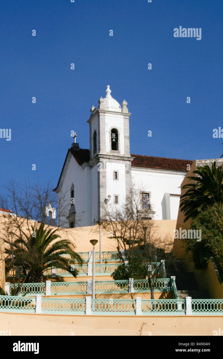 View of street in old city Sines Stock Photo - Alamy