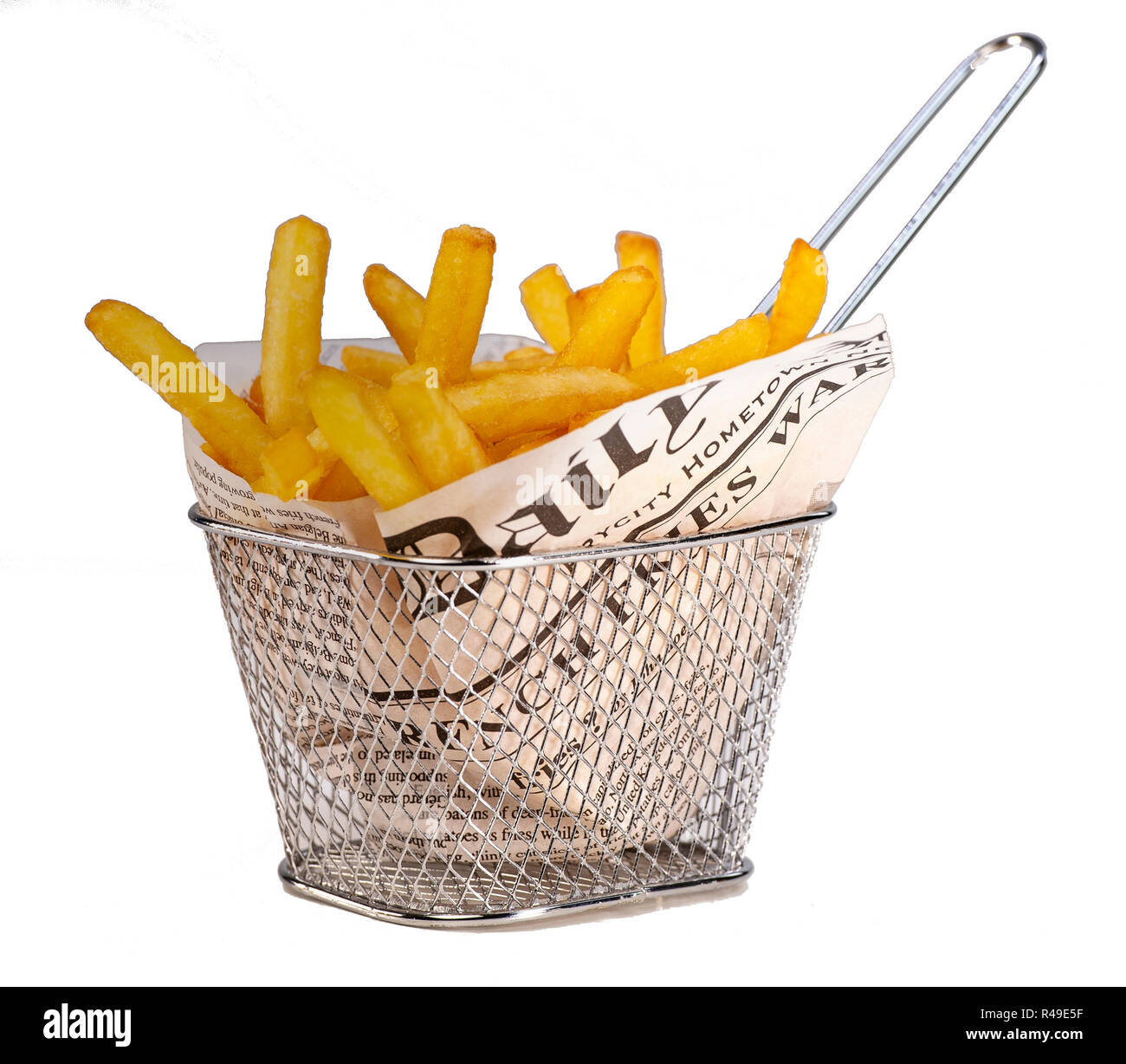Basket of freshly made French fries on white studio background, France ...
