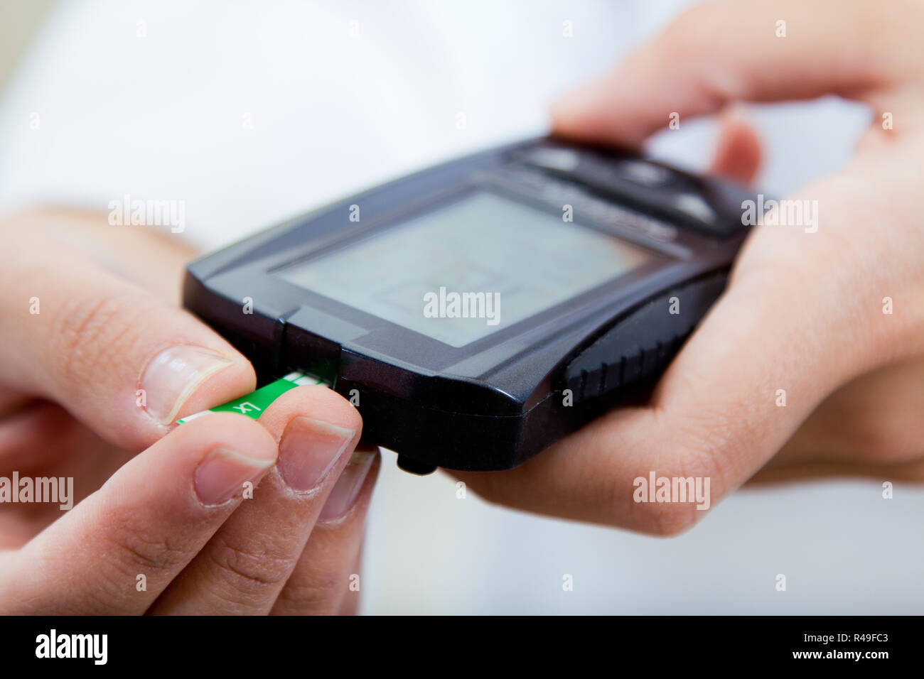 diabete-control test blood sugar with glaucometer Stock Photo - Alamy