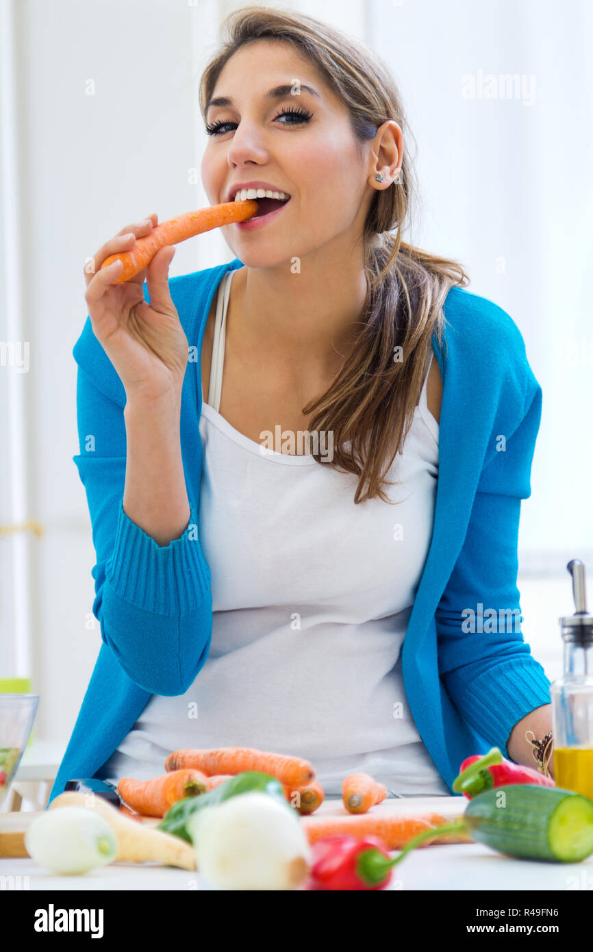 Woman eats carrot hi-res stock photography and images - Alamy