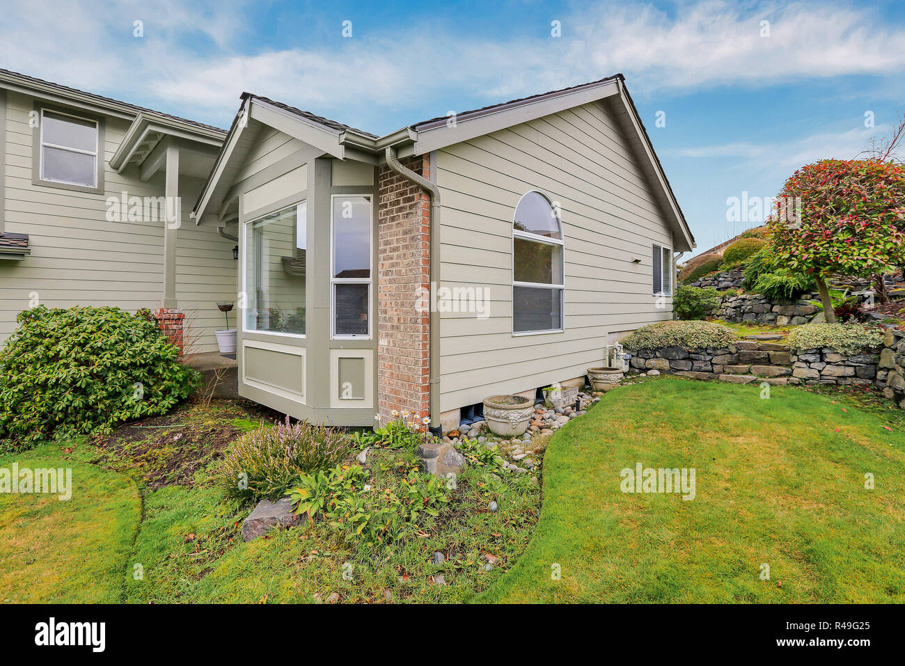 Beige brick house exterior front hi-res stock photography and images ...